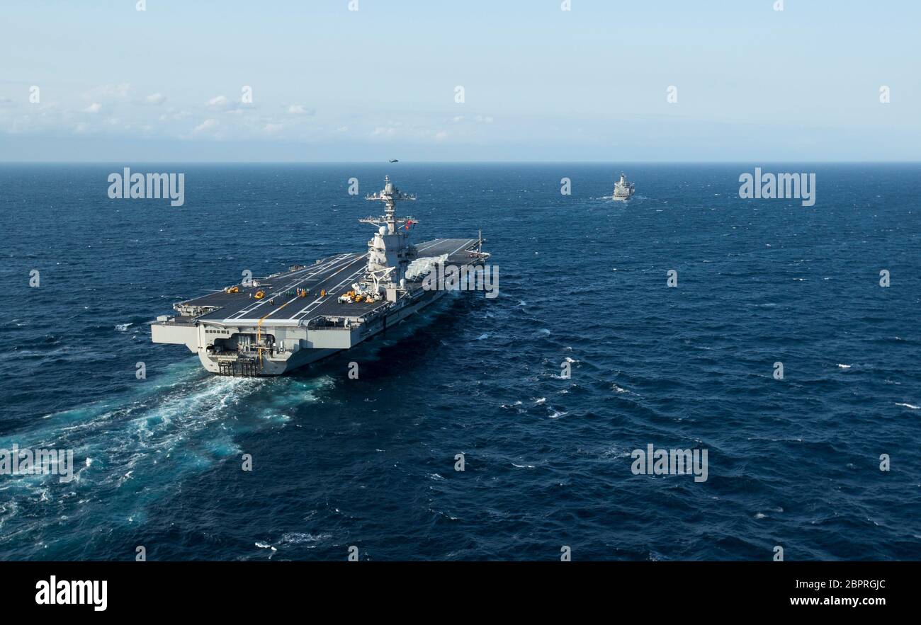 USS Gerald R. Ford (CVN 78) prepares to conduct a replenishment-at-sea ...