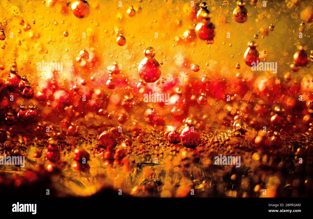 Colorful bubbly liquid in with unique shapes and pattern. Artistic ...