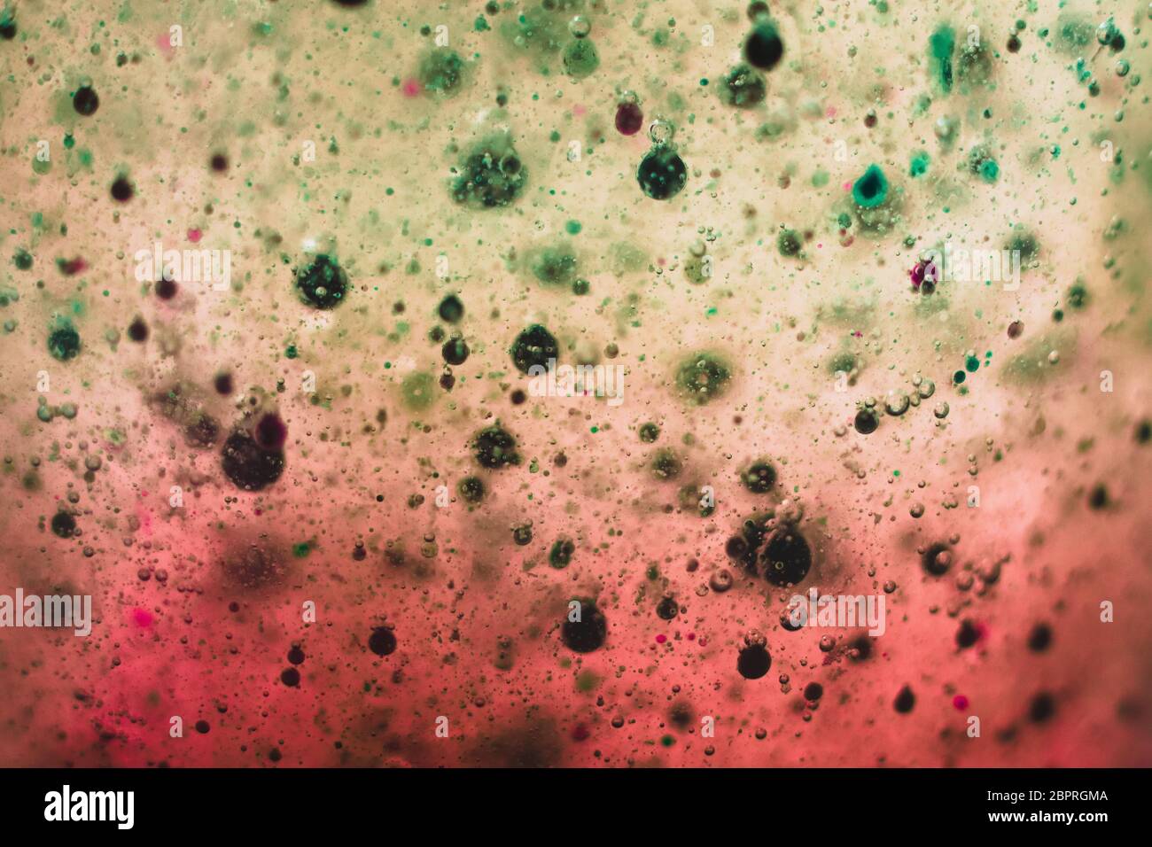 Colorful bubbly liquid in with unique shapes and pattern. Artistic ...