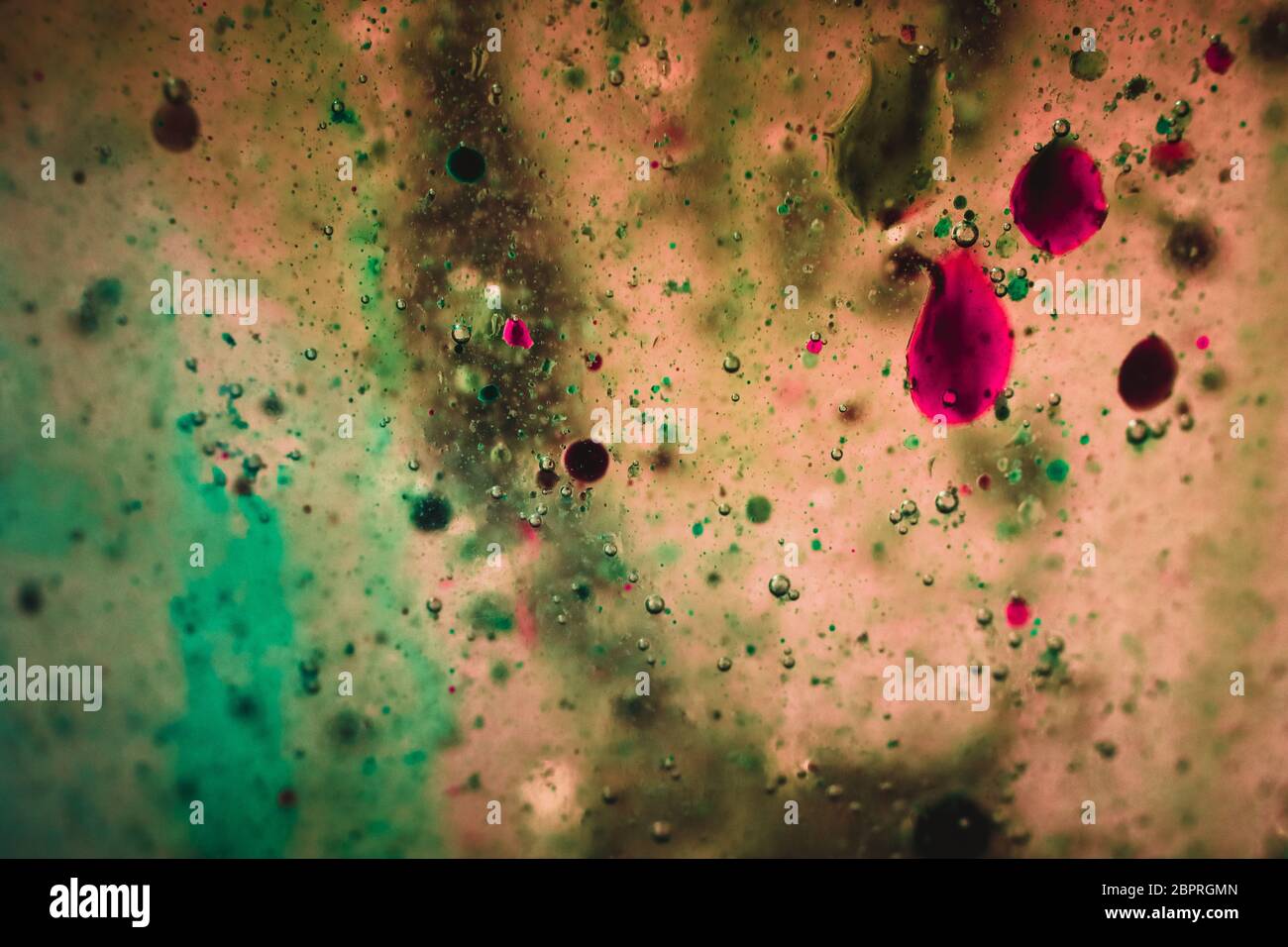 Colorful bubbly liquid in with unique shapes and pattern. Artistic ...