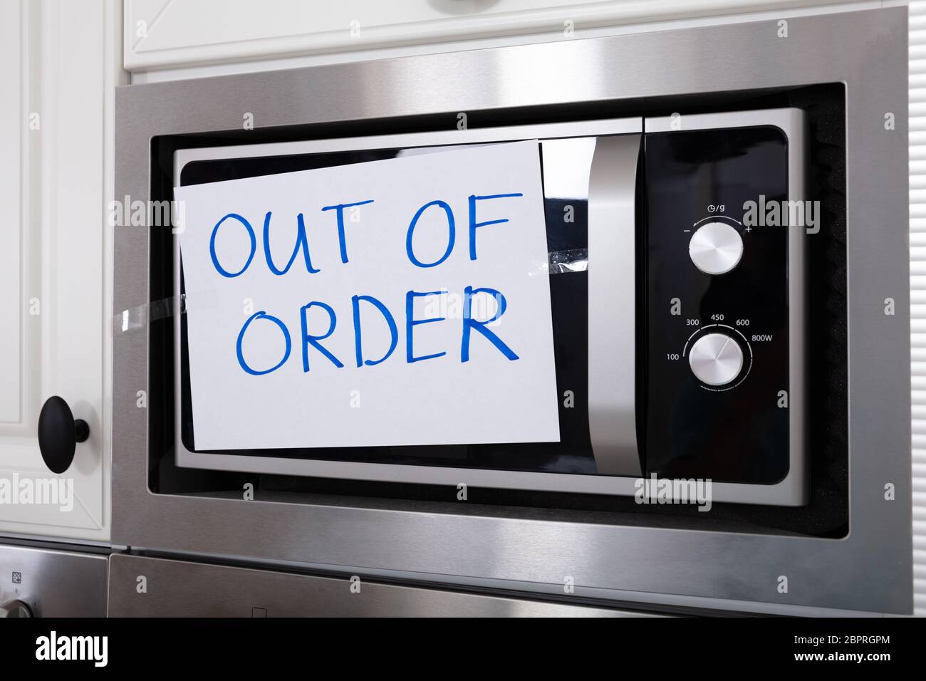 Written Text Out Of Order Message On Paper Over The Stuck Microwave ...