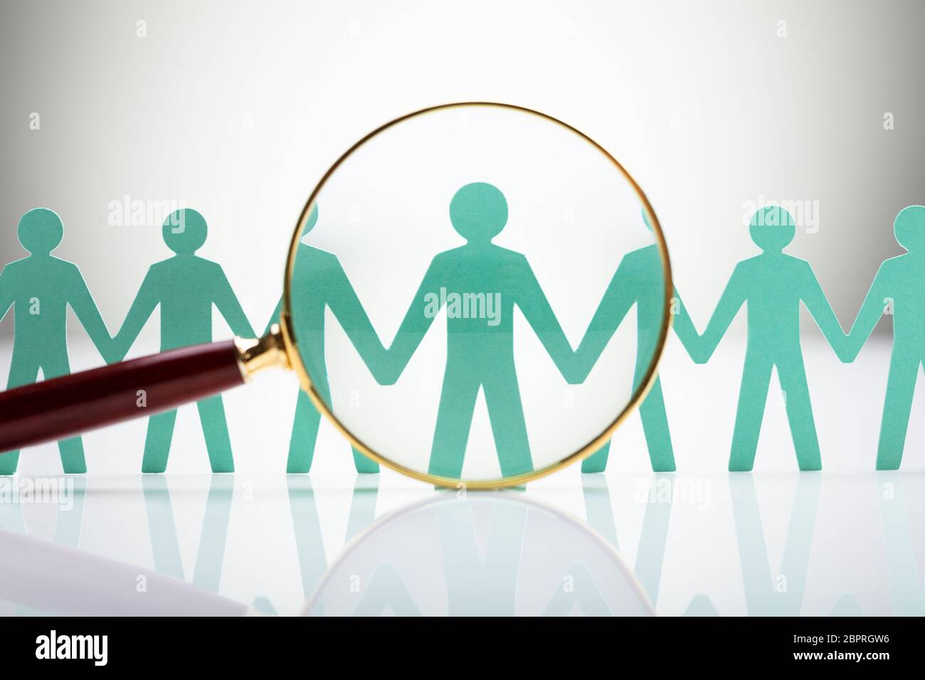 Human figure search magnifying hi-res stock photography and images - Alamy