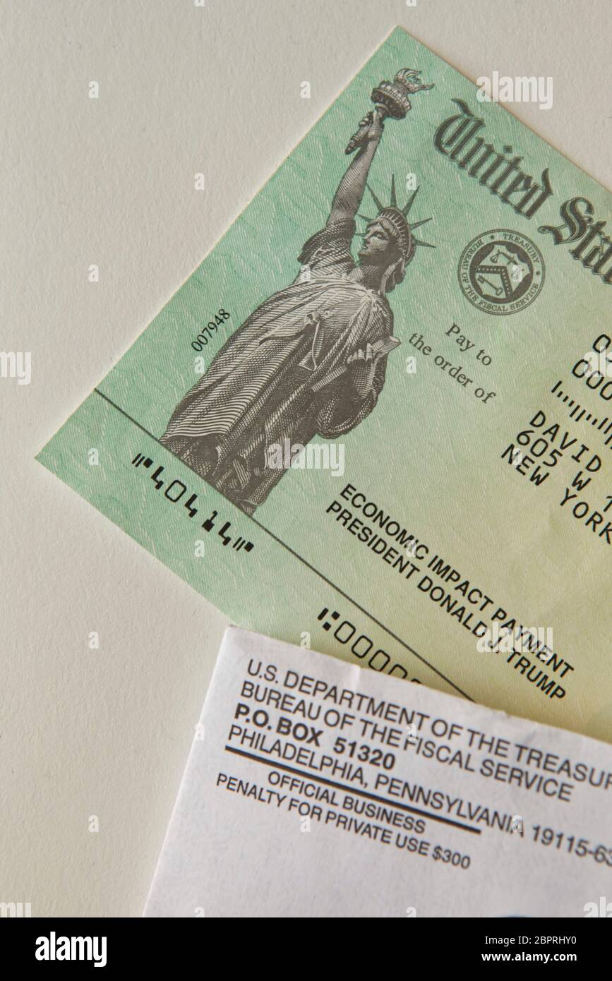 View of an Economic Impact Payment check and envelope sent by the IRS ...