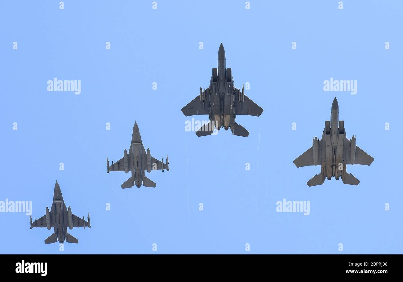 A 96th Test Wing four-ship formation of F-16 Fighting Falcons and F-15 ...