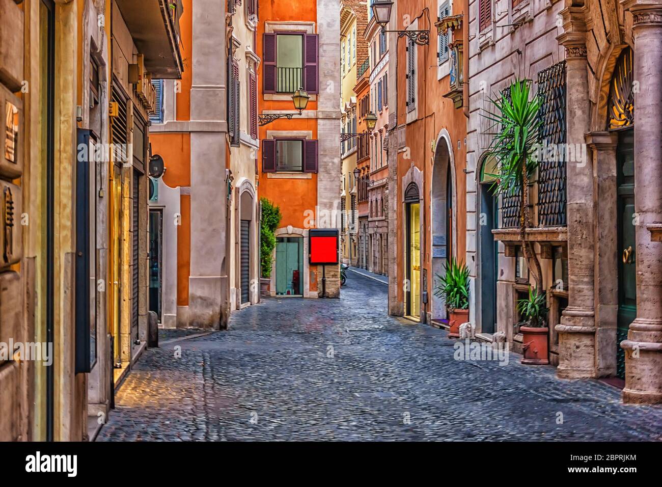Bright empty Italian street in the downtown of Rome Stock Photo - Alamy