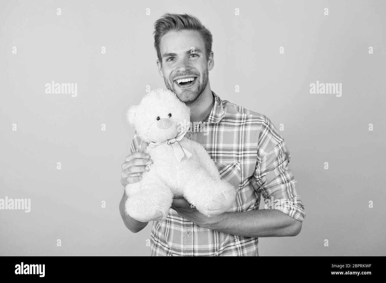 Yellow plush toy Black and White Stock Photos & Images - Alamy