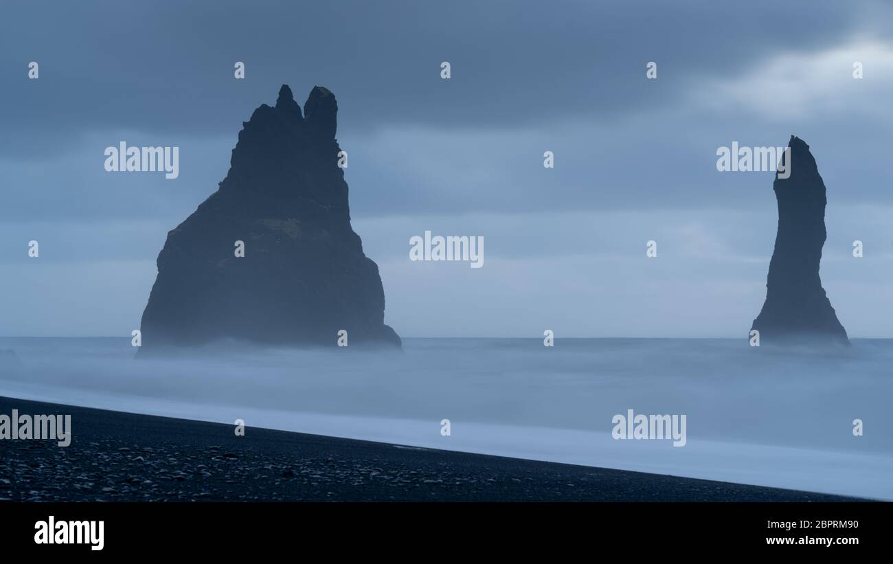 Rock spire of Reynisdrangur, coast of Reynisfjara close to Vik, Iceland ...
