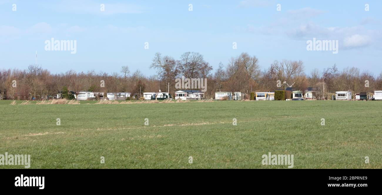Mobile homes in the typical flat dutch landscape Stock Photo - Alamy