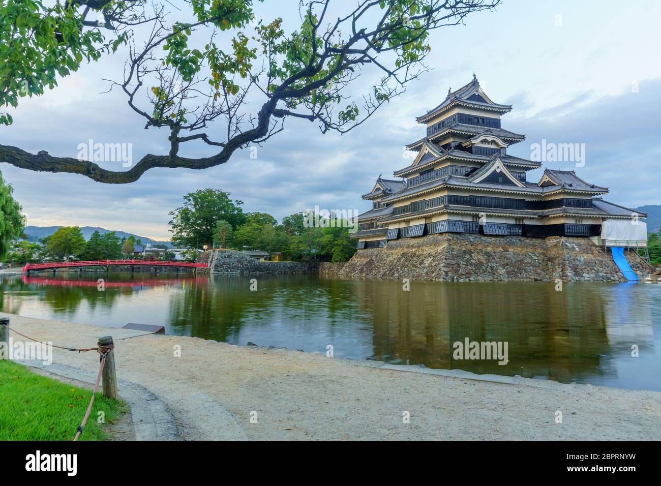 Sunset view of the Matsumoto Castle (or Crow Castle) and bridge, in ...