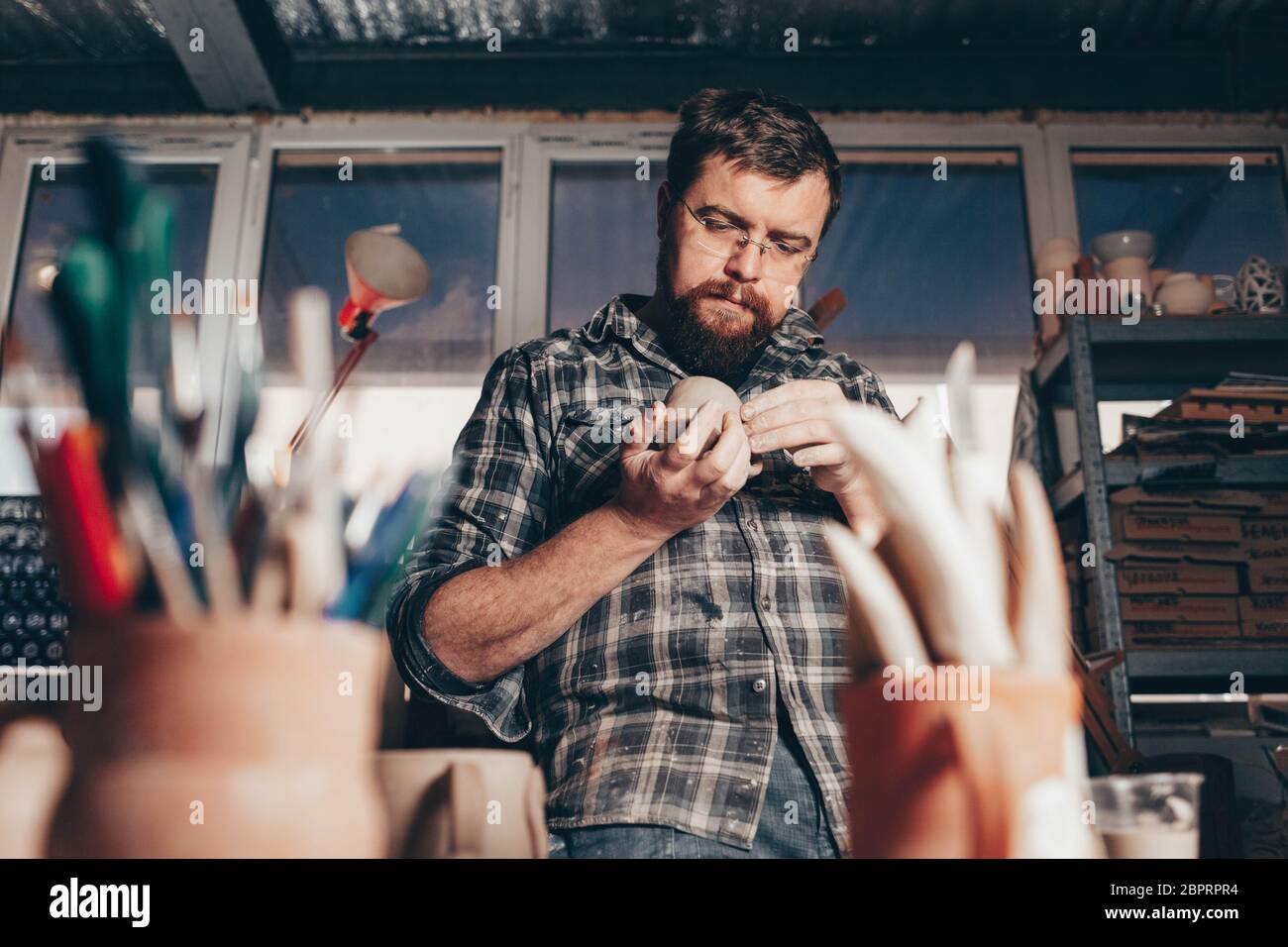 Caucasian male potter man hi-res stock photography and images - Alamy