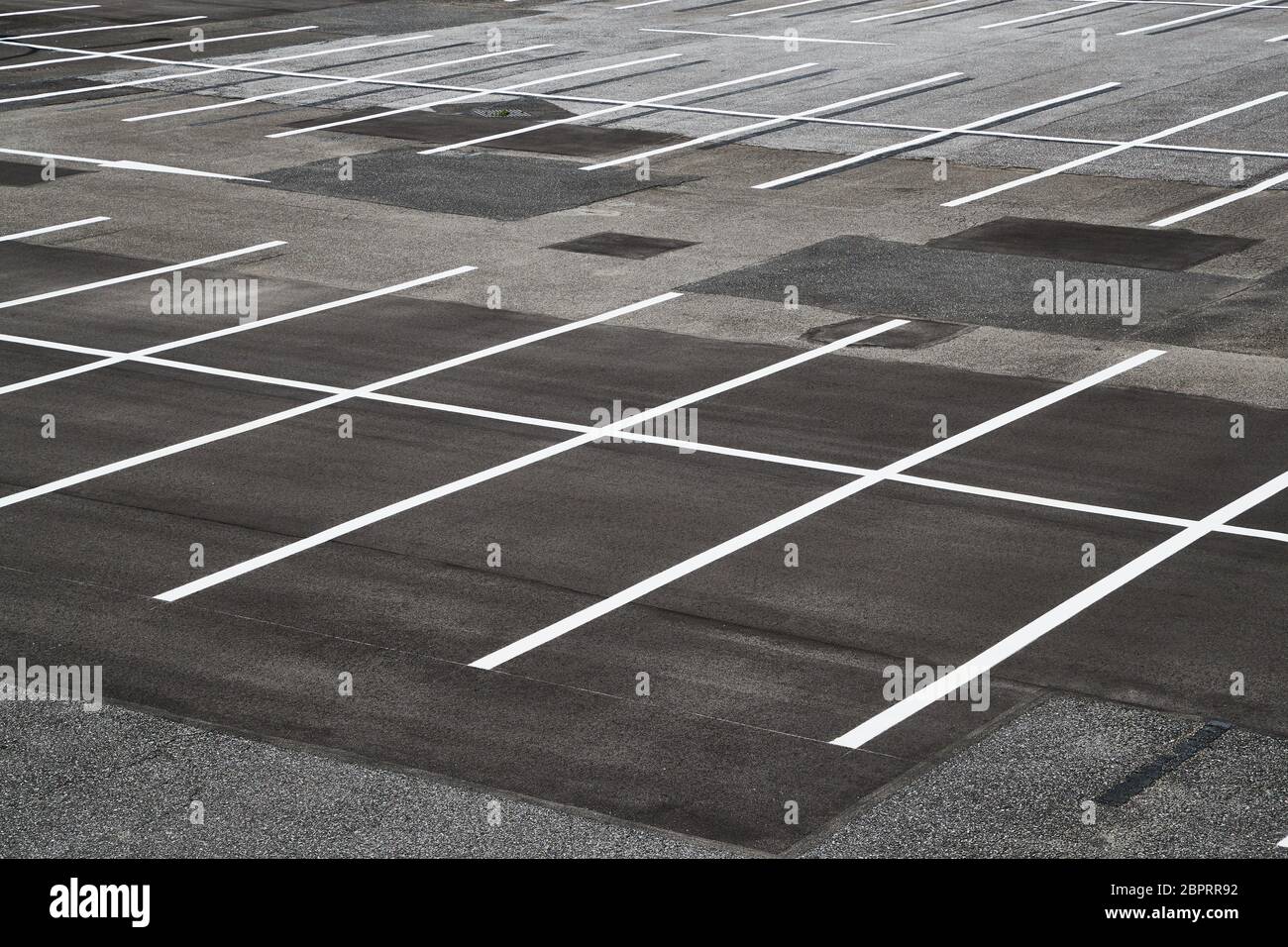 Parking lot with empty places Stock Photo - Alamy