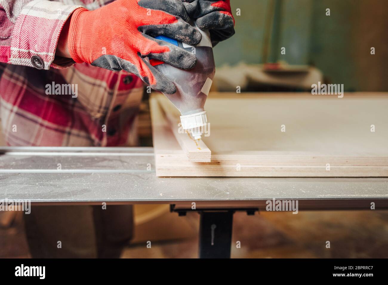 Gluing process hi-res stock photography and images - Alamy