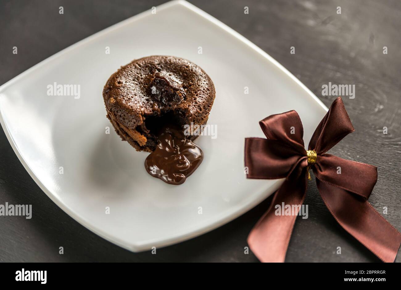 Fondant decorated with cocktail cherry Stock Photo - Alamy