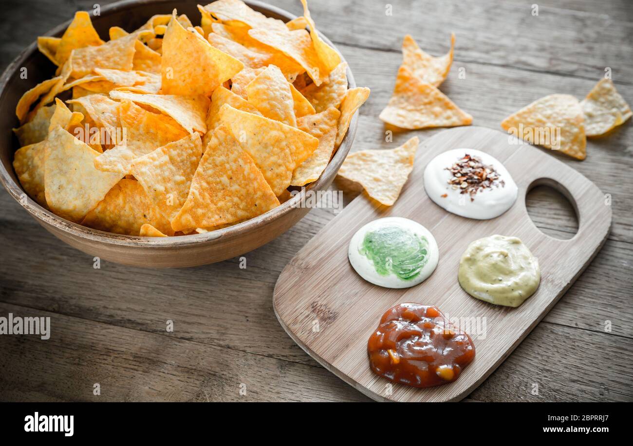 Cheese nachos in the bowl Stock Photo - Alamy