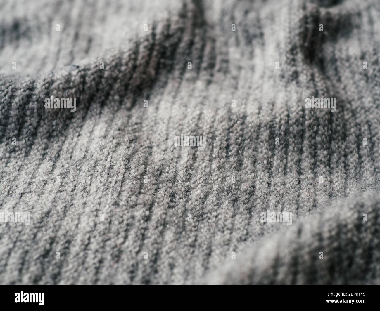 Gray sweater fabric texture. Clothes sweater background with folds ...