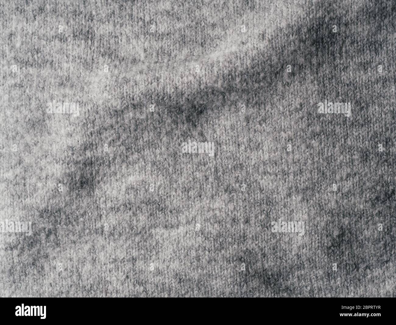 Gray sweater fabric texture. Clothes sweater background with folds ...