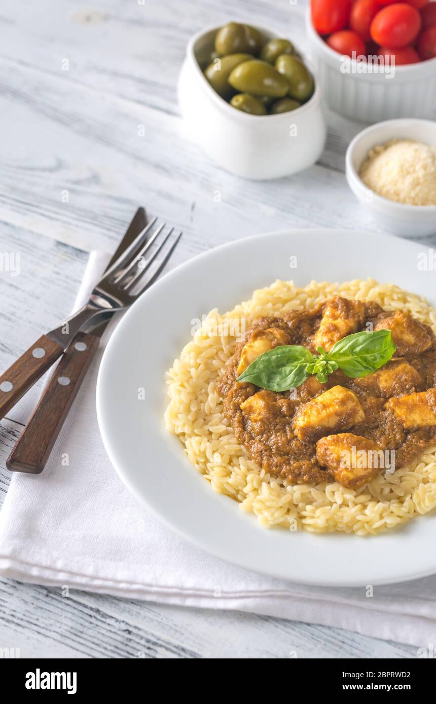 Pasta with korma sauce Stock Photo - Alamy