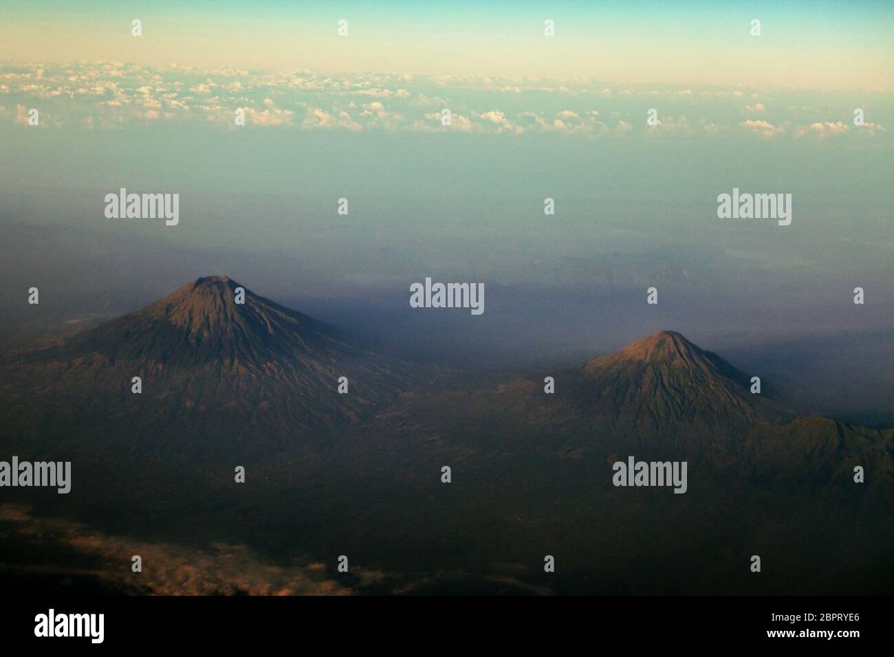Mount Sumbing (left) and Mount Sundoro (right), aerial view from a ...