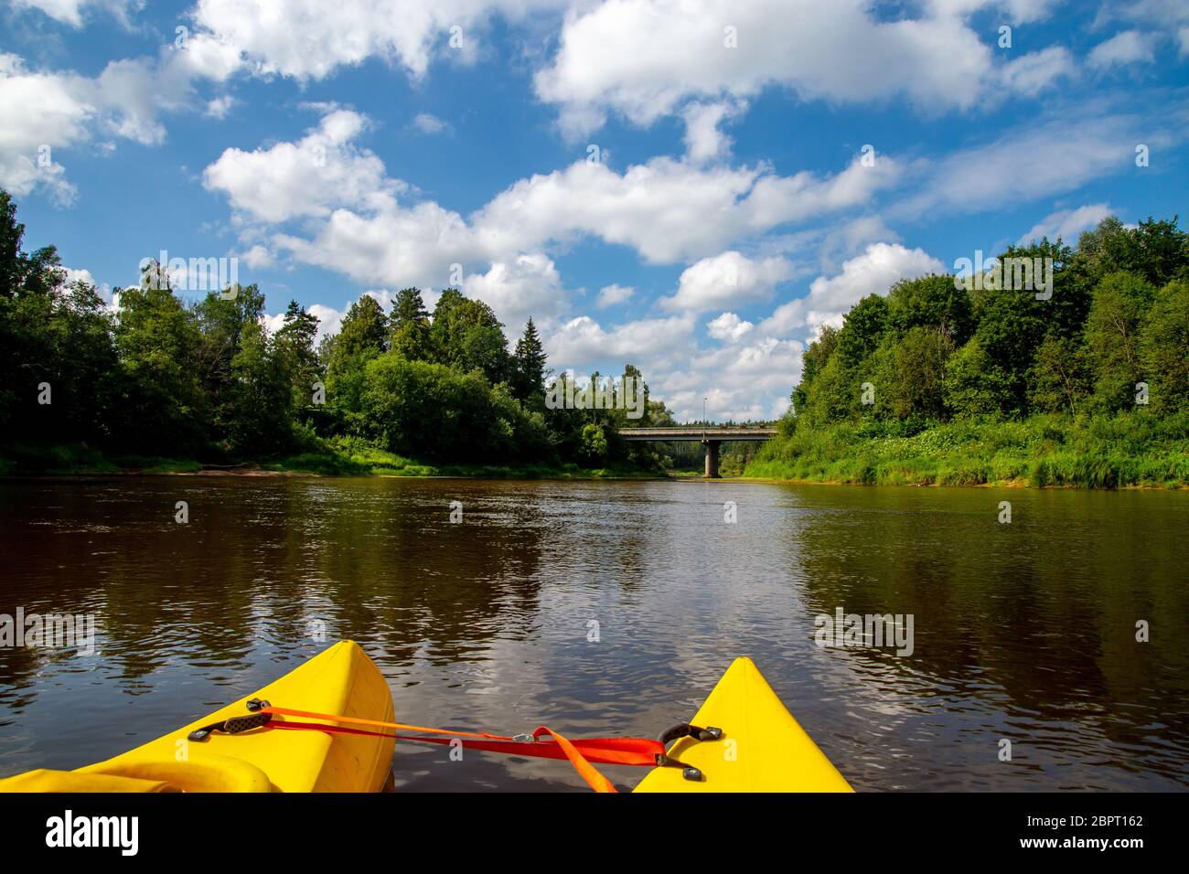 Kayak and canoe ride in river Gauja in Latvia. Boat ride by the river ...