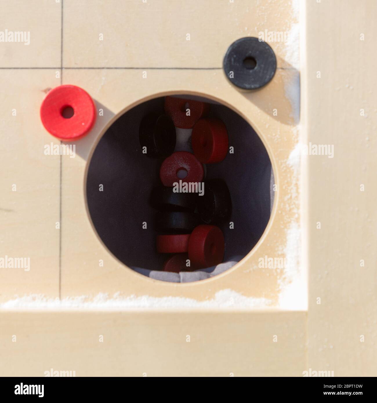 Novuss game board with pocket in corner. Novuss is a national sport in ...