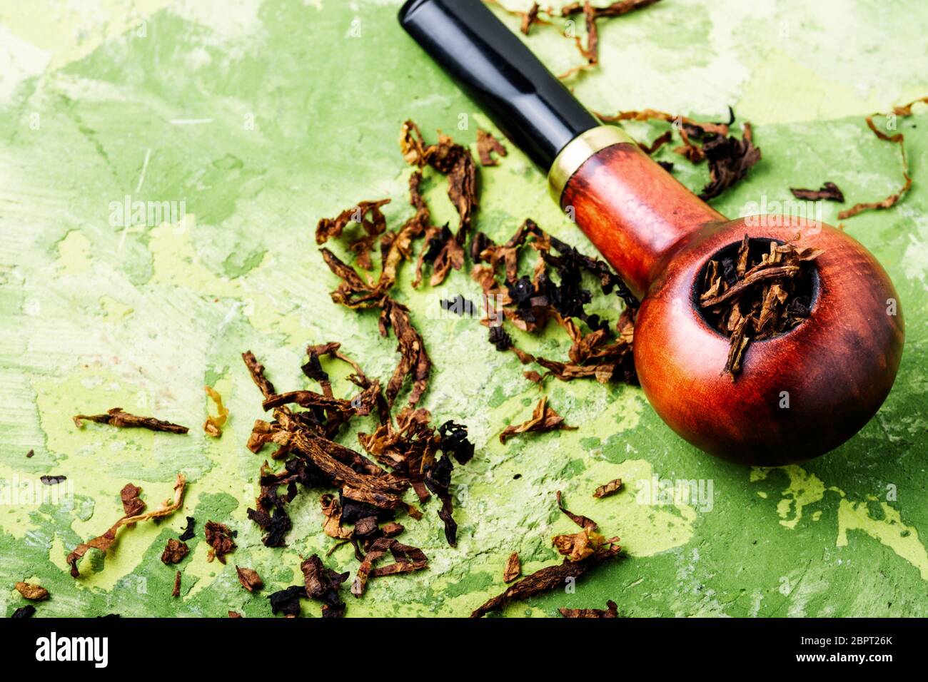 Tobacco pipe or smoking pipe on slate table Stock Photo - Alamy