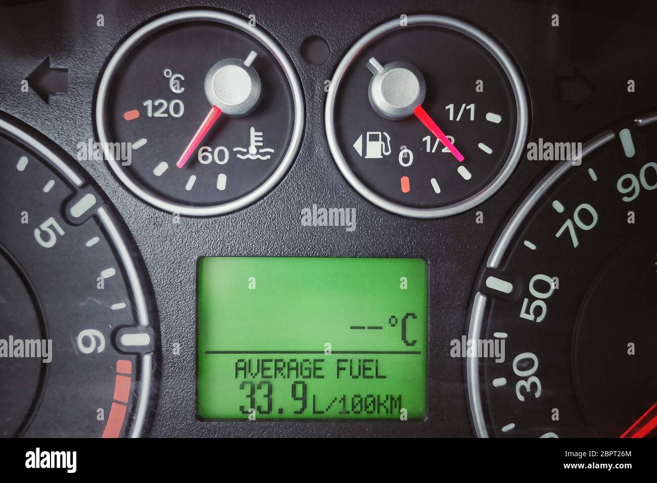 Color close up of a car's digital display, showing a very high fuel ...