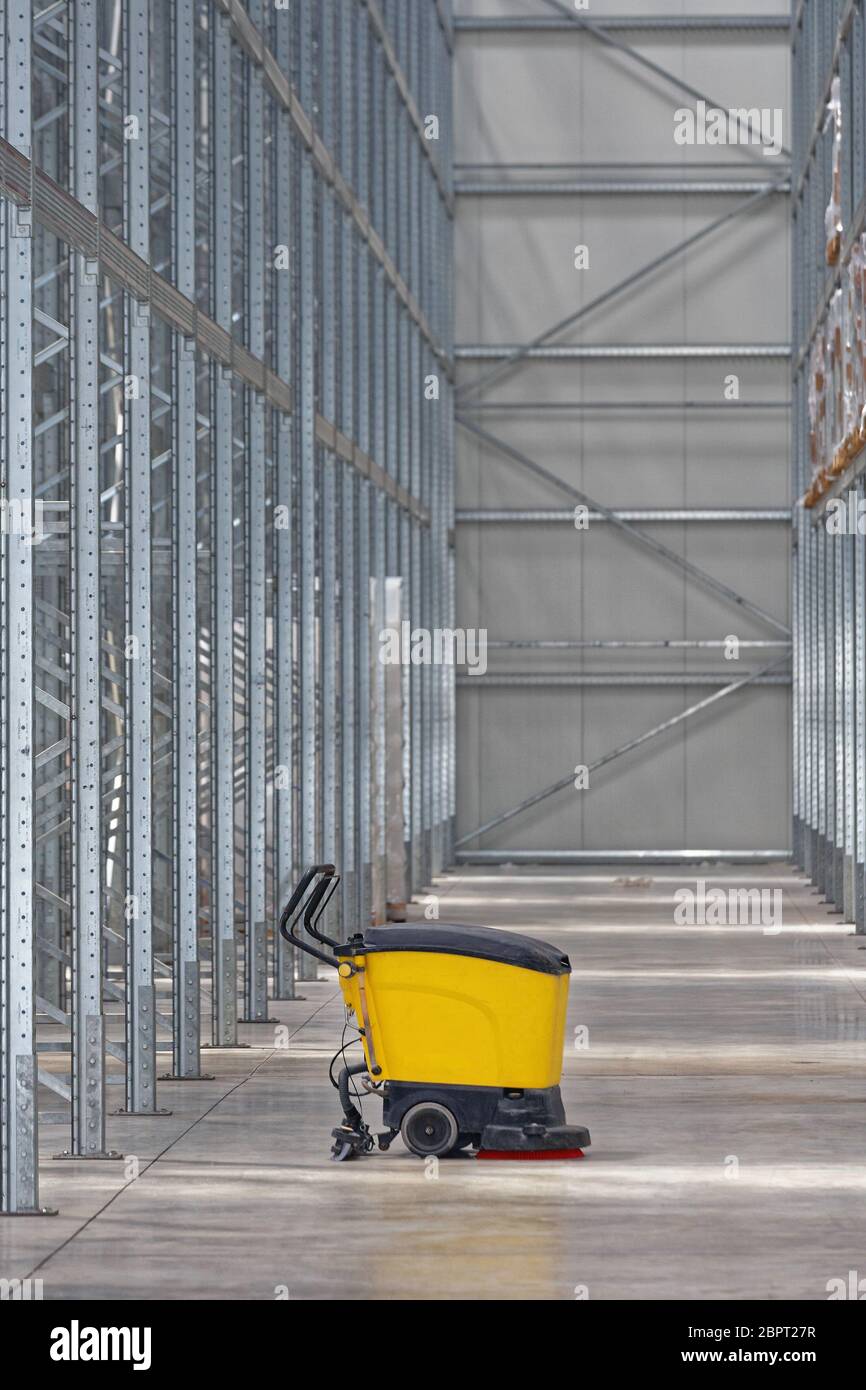 Walk Behind Scrubber Machine For Cleaning Warehouse Floor Stock Photo ...