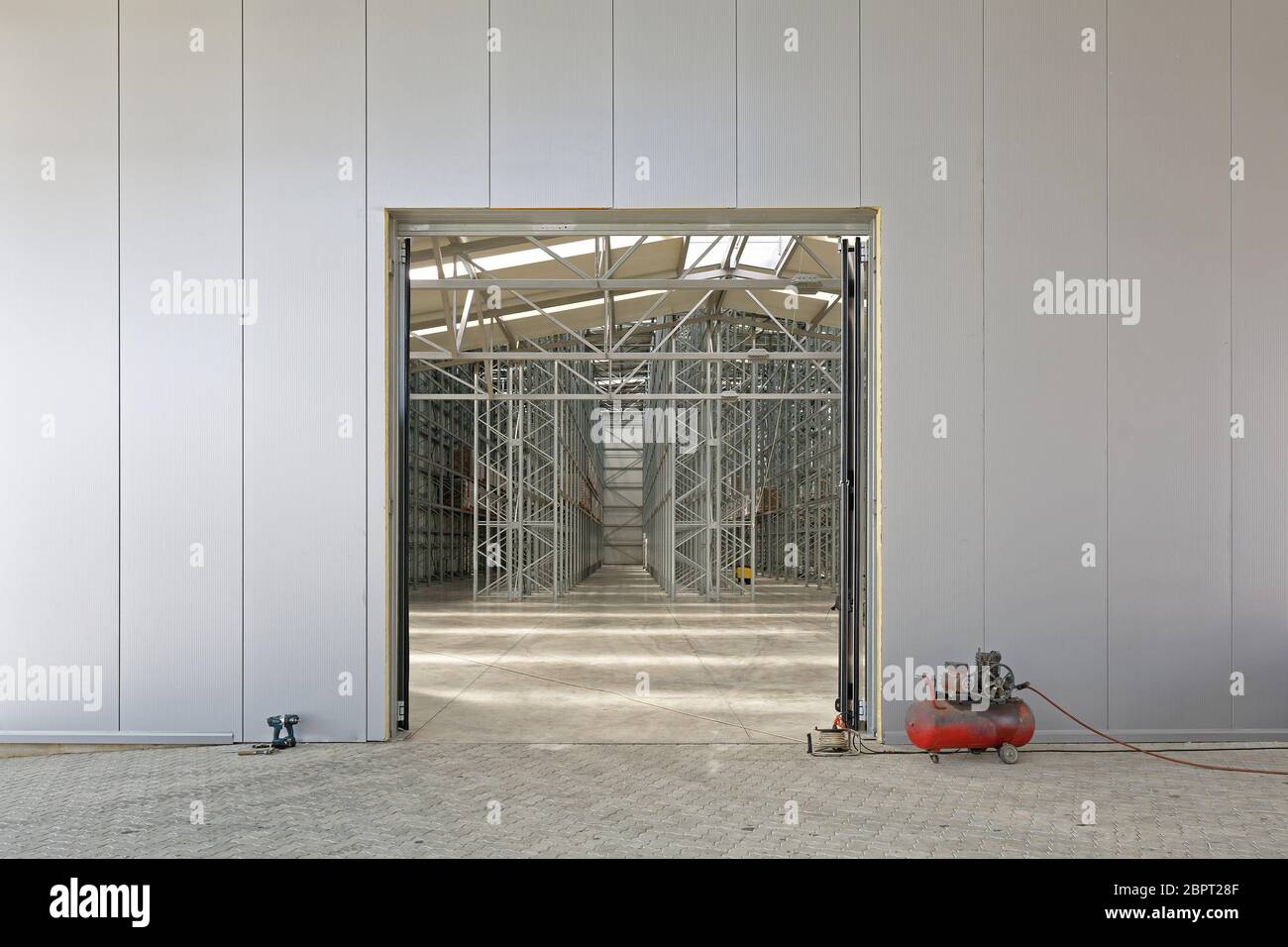 Open Big Door at Distribution Warehouse Building Entrance Stock Photo ...