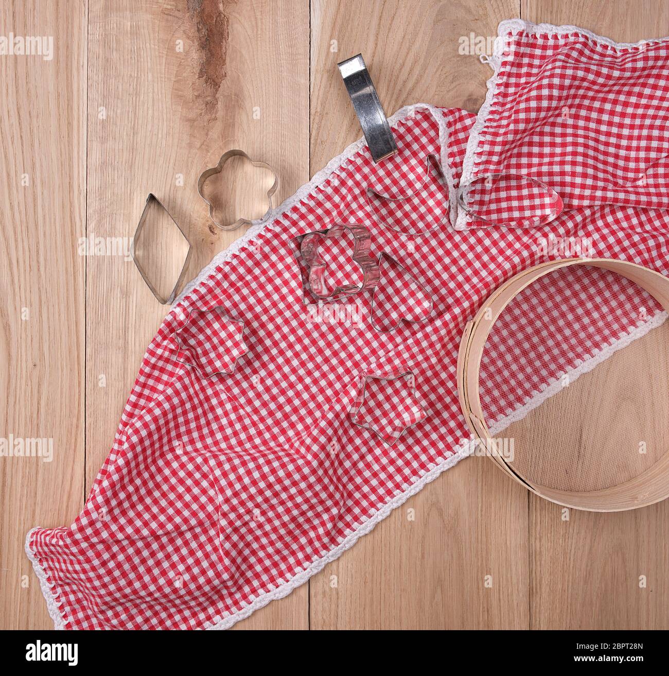 wooden sieve and other kitchen items on the board, top view Stock Photo ...