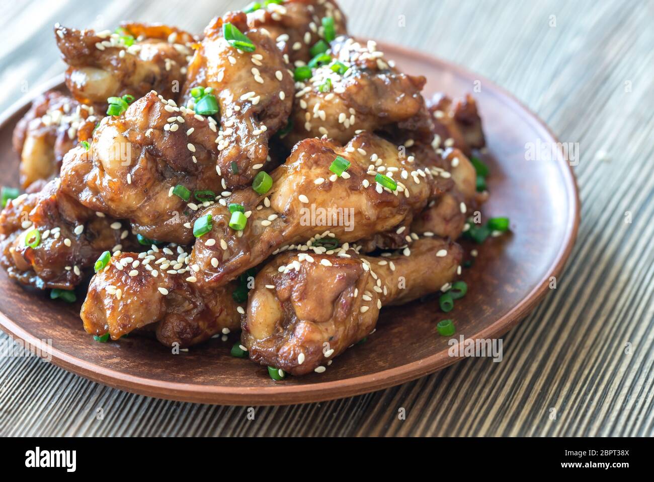 Chicken teriyaki wings Stock Photo - Alamy