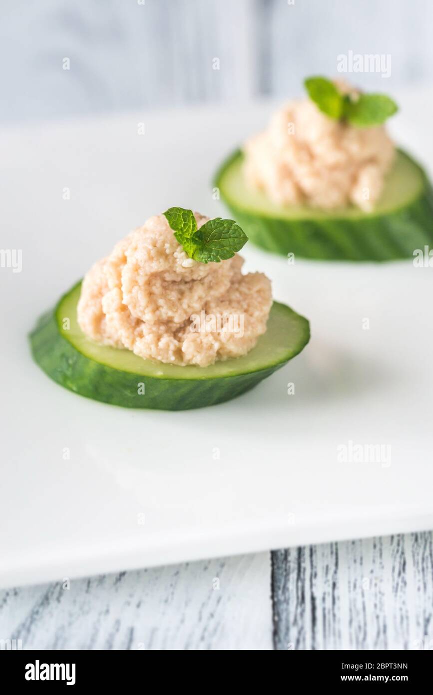 Cucumber caviar canapes Stock Photo - Alamy