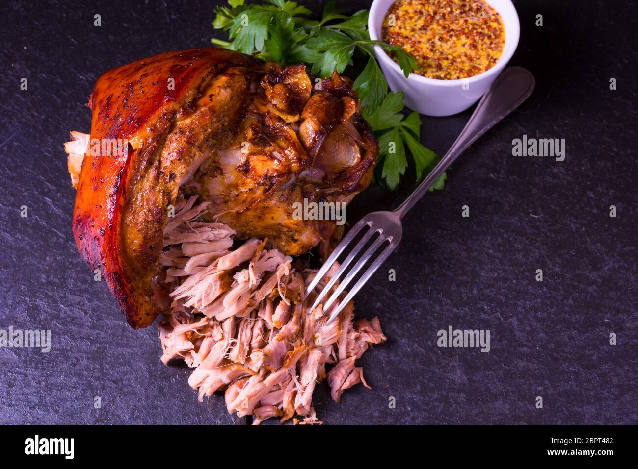 crispy fried Bavarian pork knuckle with soft meat Stock Photo - Alamy