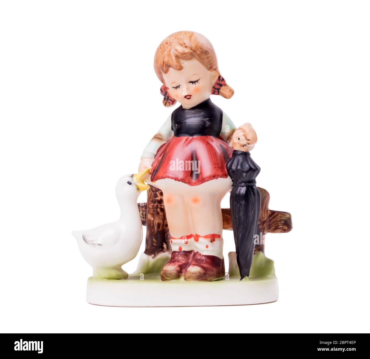 Very old statue, small ceramic girl with a goose, isolated on white ...