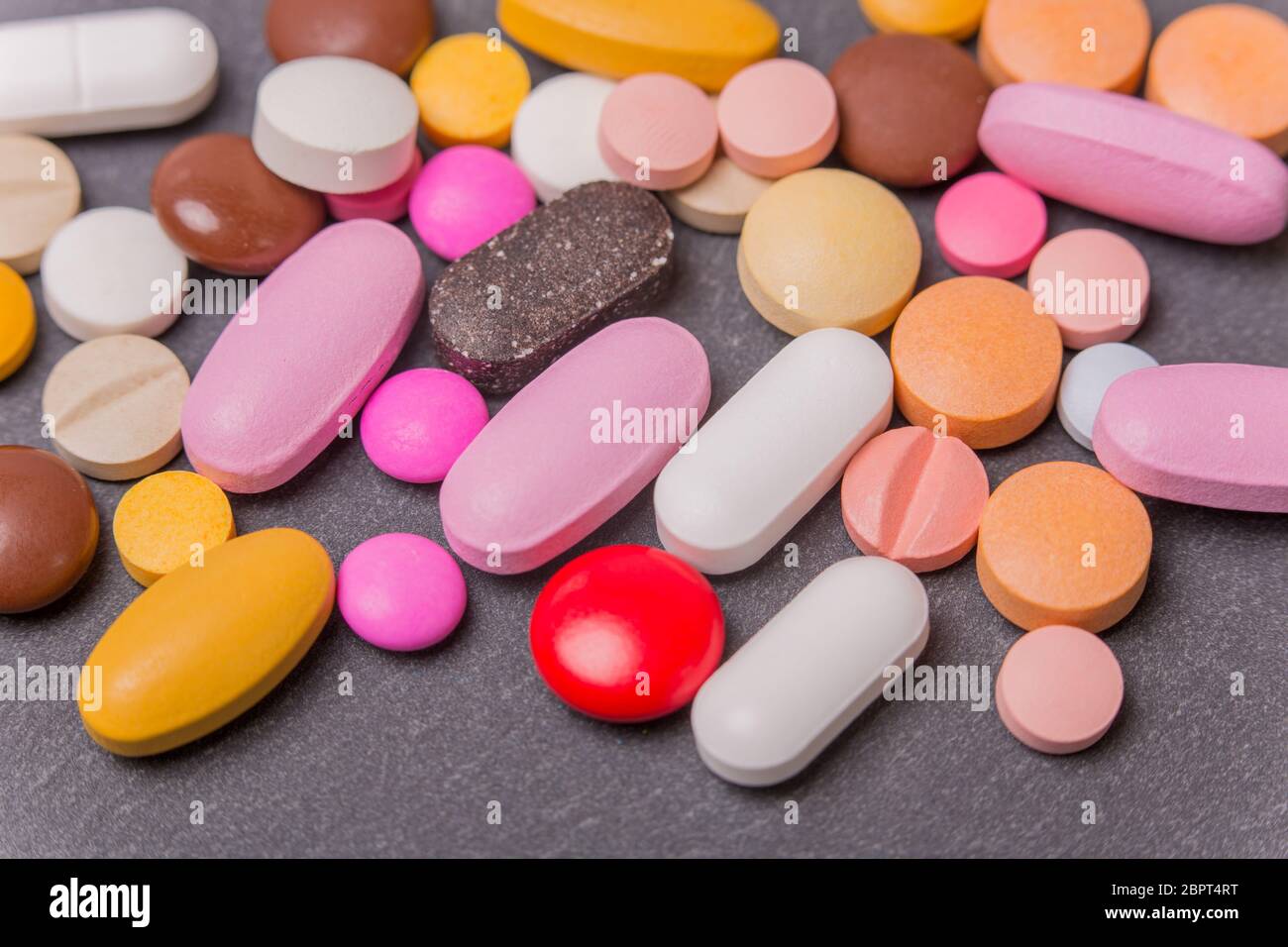 different Tablets pills capsule heap mix therapy drugs Stock Photo - Alamy