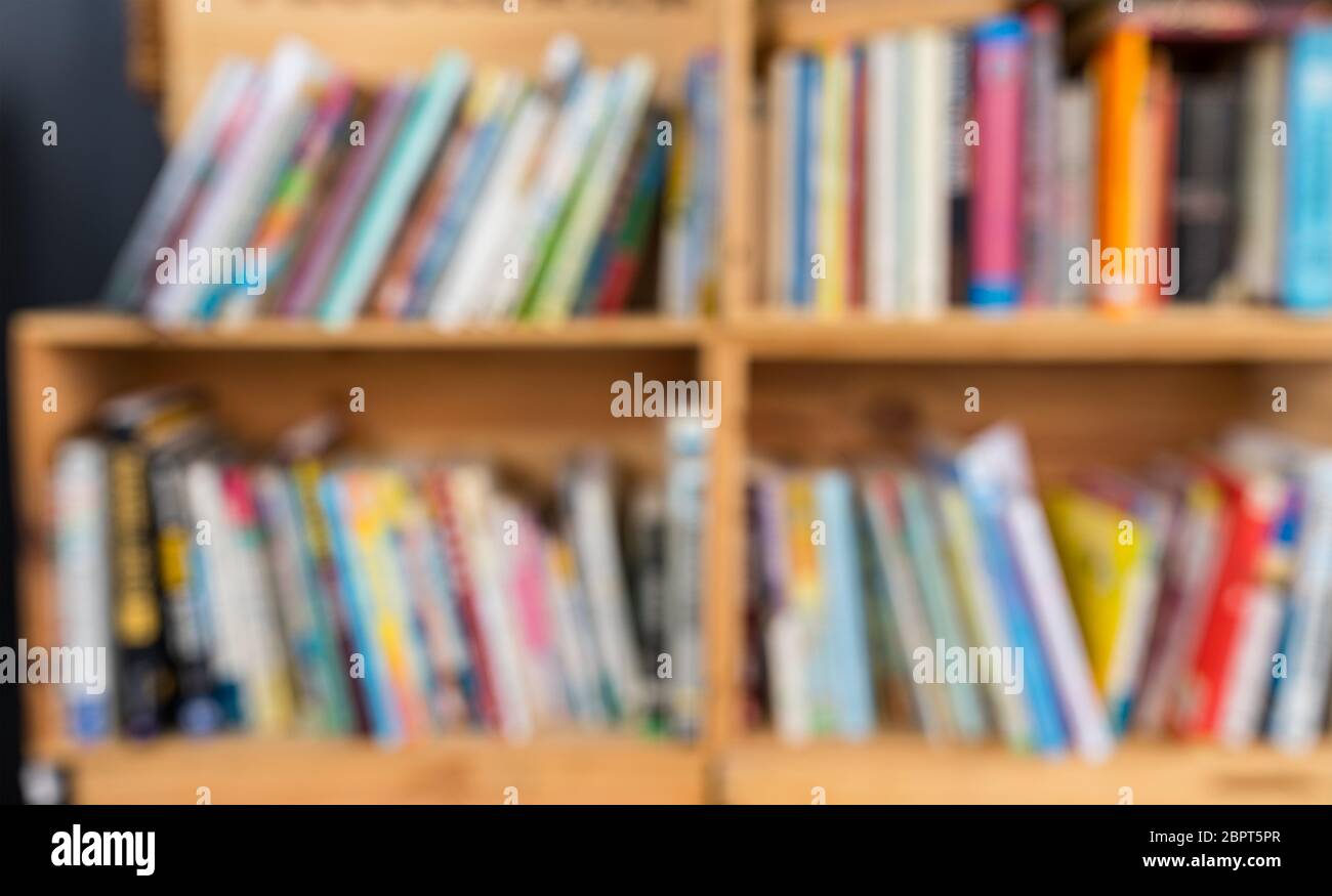 Blur view of bookshelf Stock Photo - Alamy