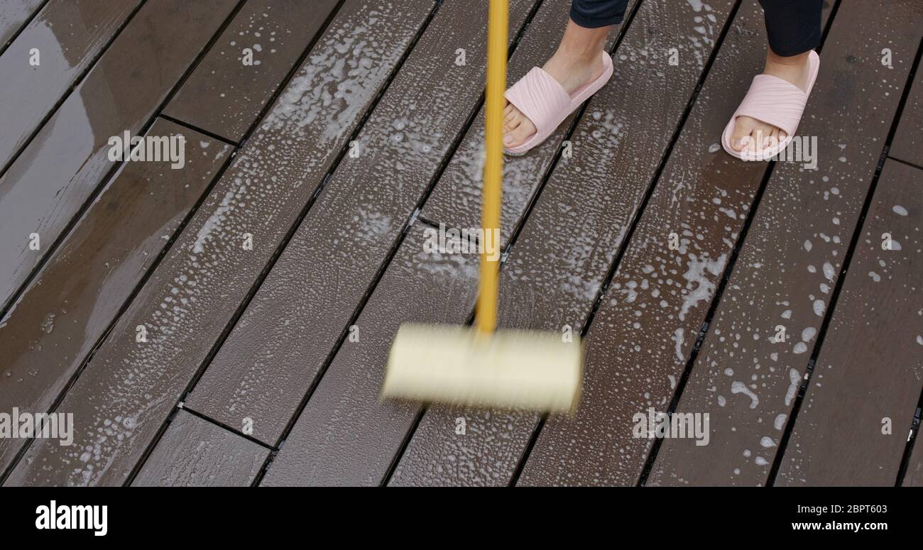 Woman clean the floor at outdoor Stock Photo - Alamy