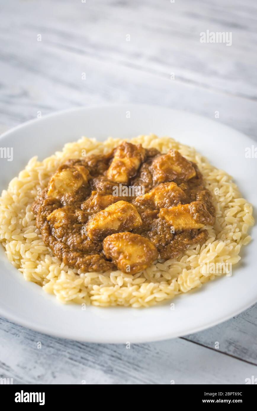 Pasta with korma sauce Stock Photo - Alamy