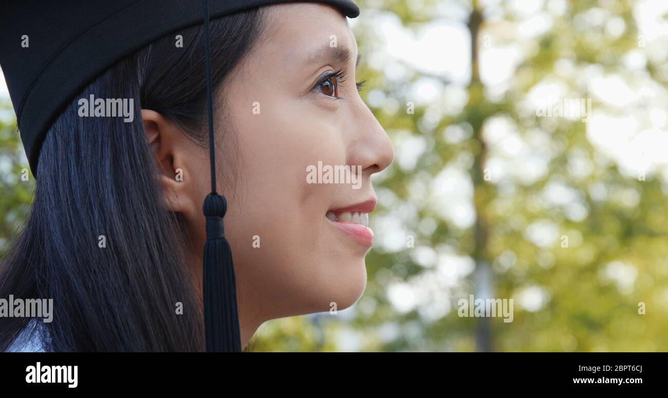 Side profile of woman get graduation Stock Photo - Alamy