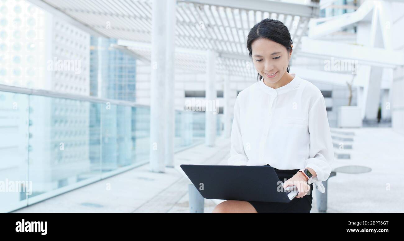 Asian Business woman work on laptop computer Stock Photo - Alamy
