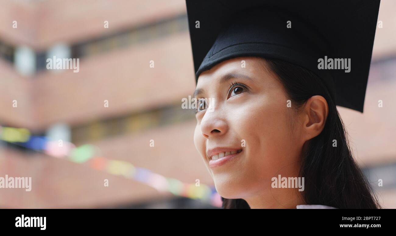 Confident woman get graduation Stock Photo - Alamy