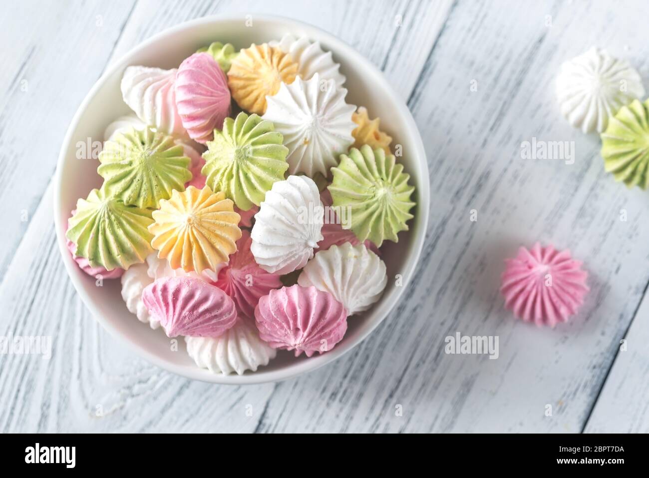 Bowl of colored meringues Stock Photo - Alamy