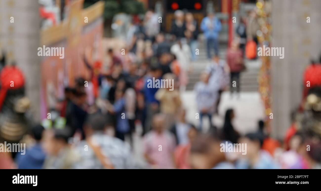 Blur of people visit chinese temple Stock Photo - Alamy