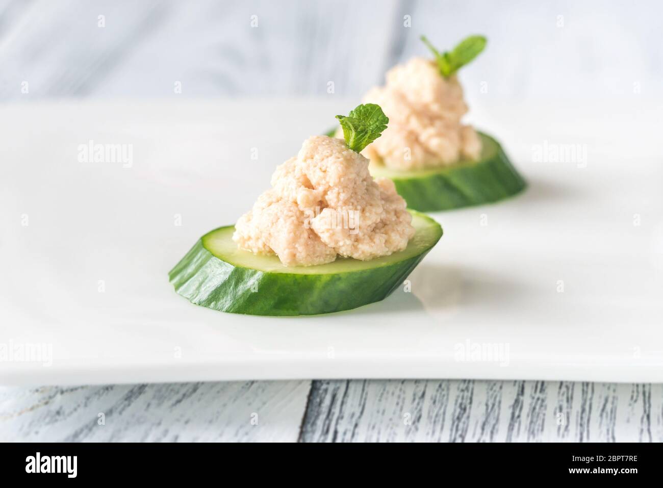 Cucumber caviar canapes Stock Photo - Alamy