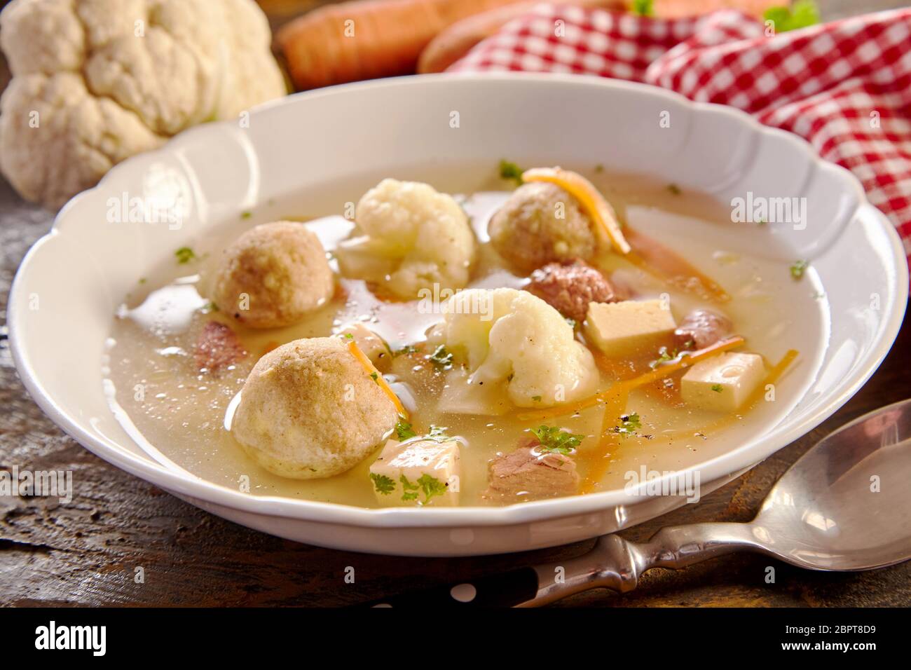 Specialist spring soup with German bone marrow dumplings in a broth ...