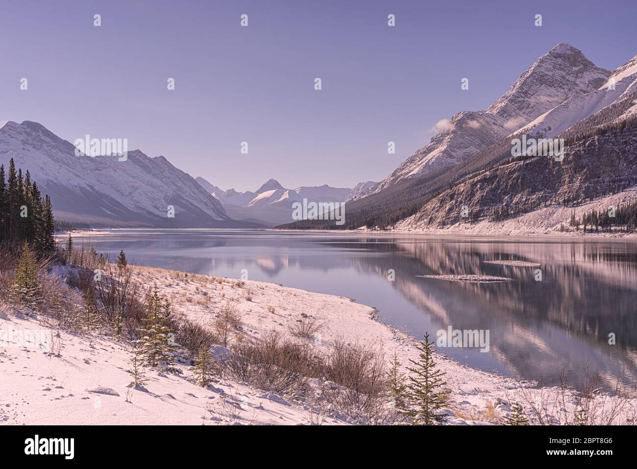 Landscape of witner mountain reflections on spray lake Stock Photo - Alamy