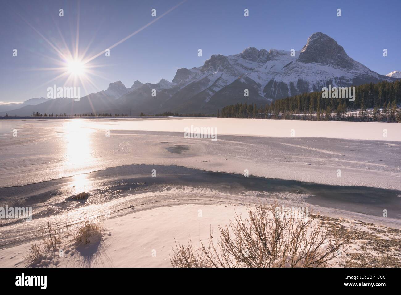Landscape of Goat Pond in Winter with sunburst Stock Photo - Alamy