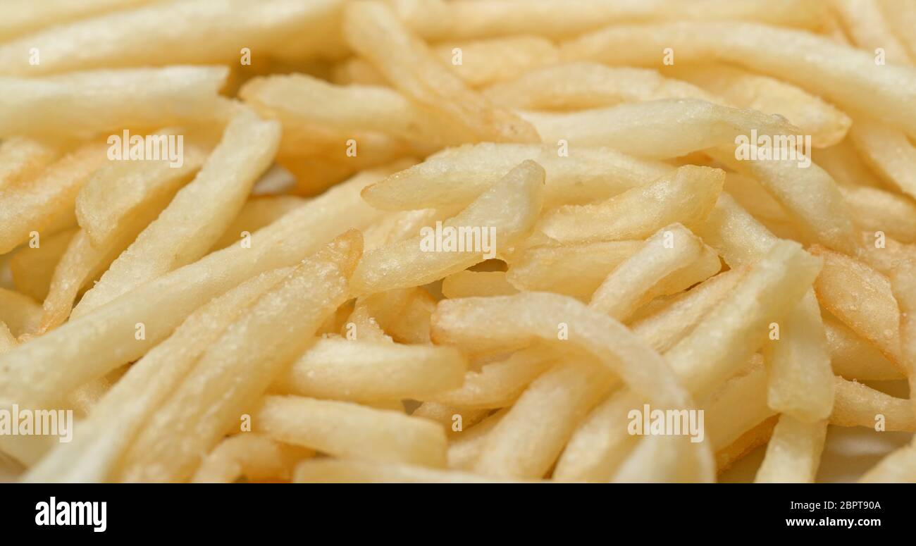 Stack of French fries Stock Photo - Alamy
