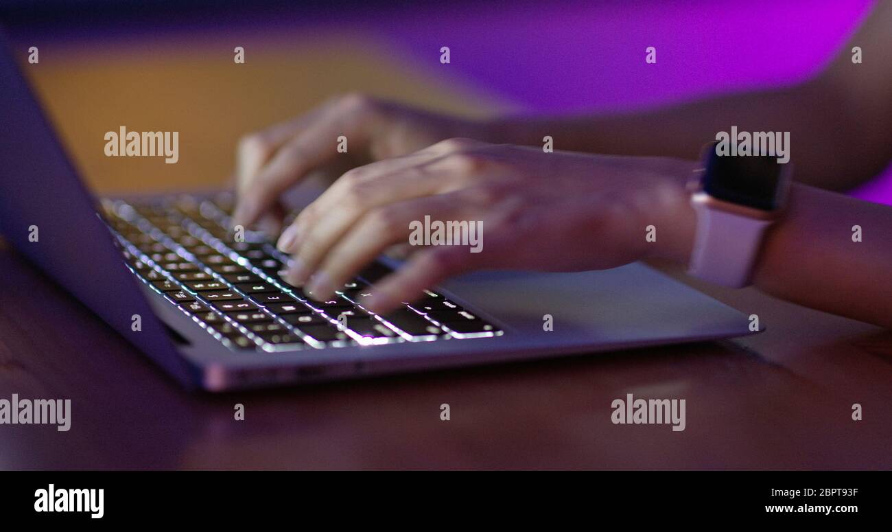 Type on laptop computer Stock Photo - Alamy