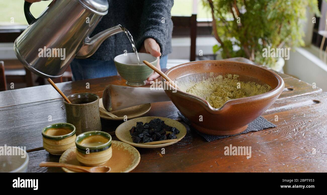 The process of making traditional chinese ground tea, Hakka Lai Cha ...