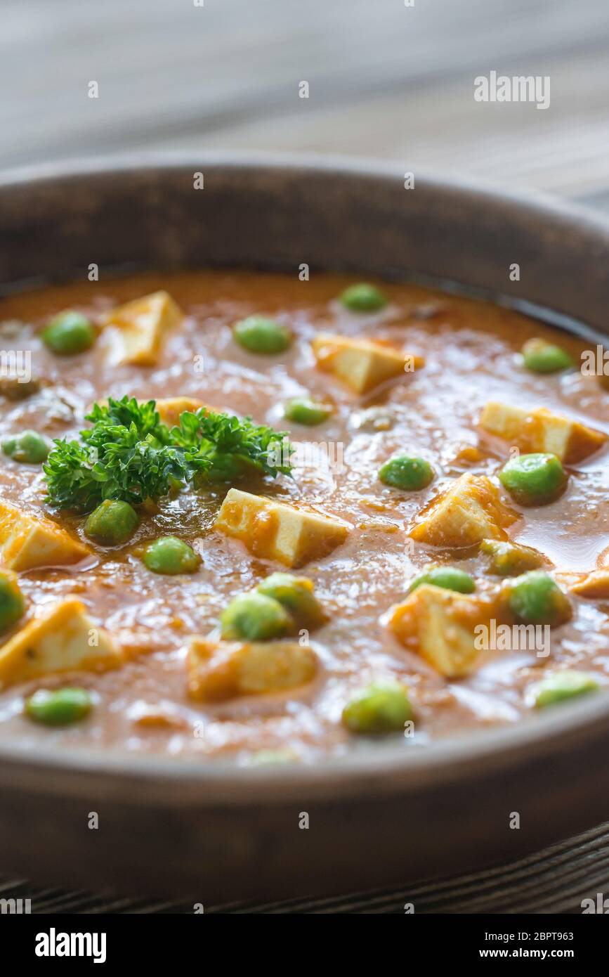 Bowl of mattar paneer Stock Photo - Alamy
